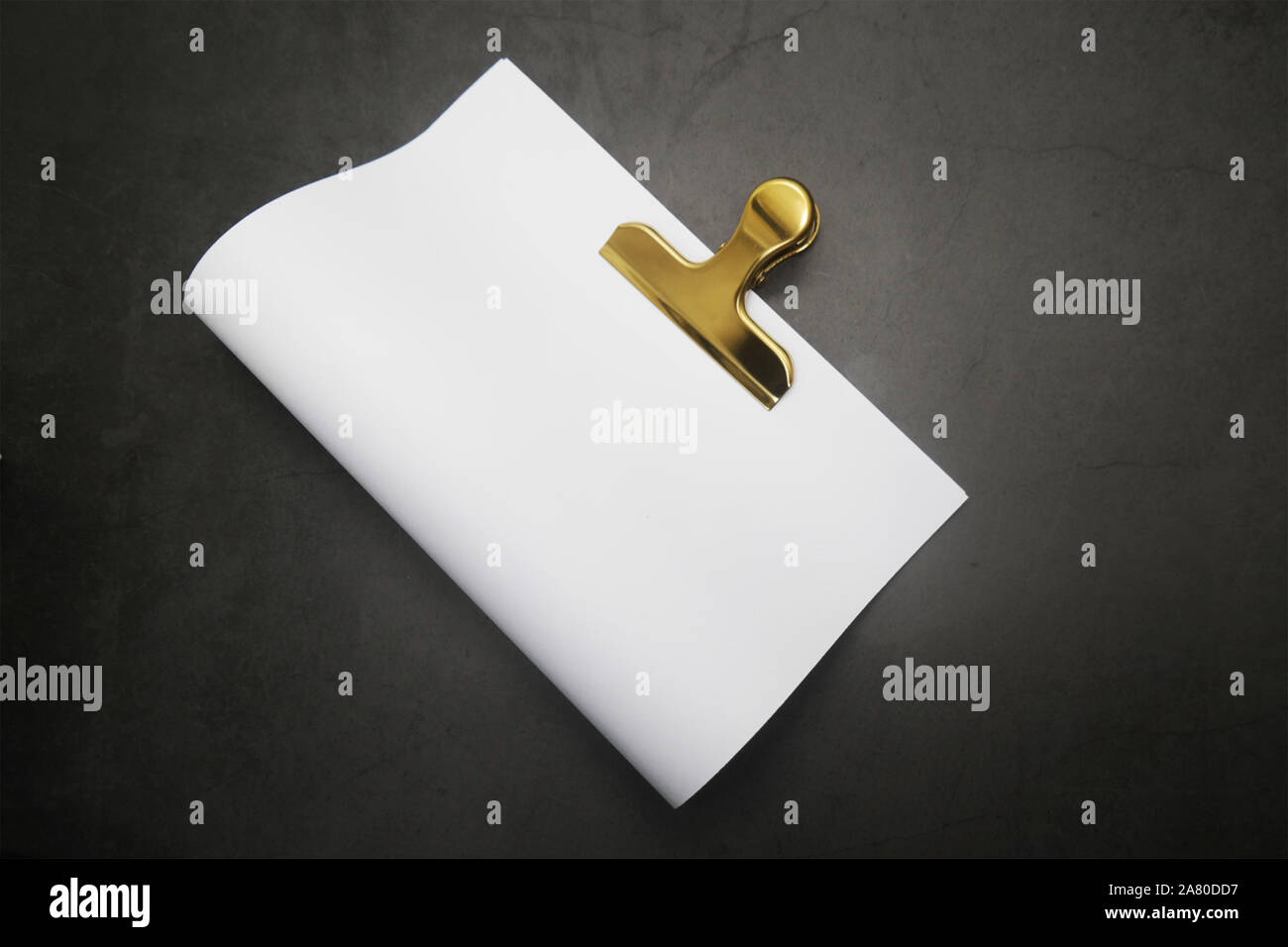 Gold paper clip hi-res stock photography and images - Alamy