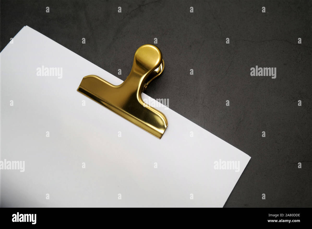 Gold paper clip hi-res stock photography and images - Alamy