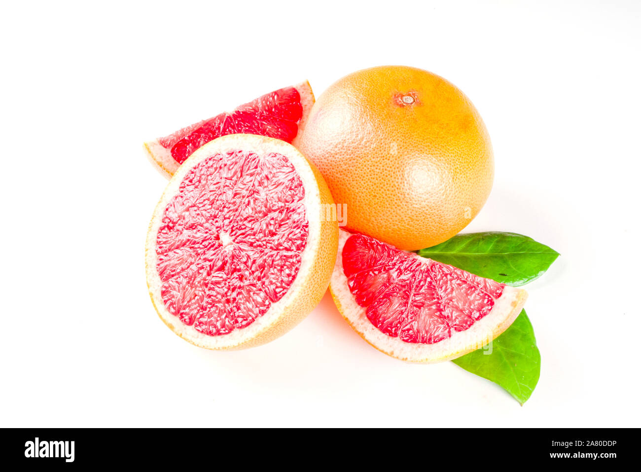 Whole and sliced grapefruit isolated on white background Stock Photo ...