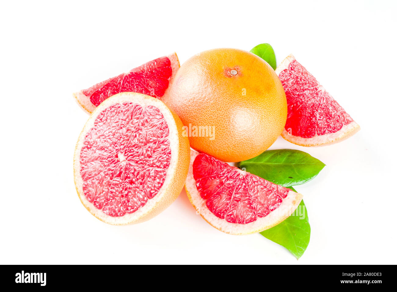 Whole and sliced grapefruit isolated on white background Stock Photo ...