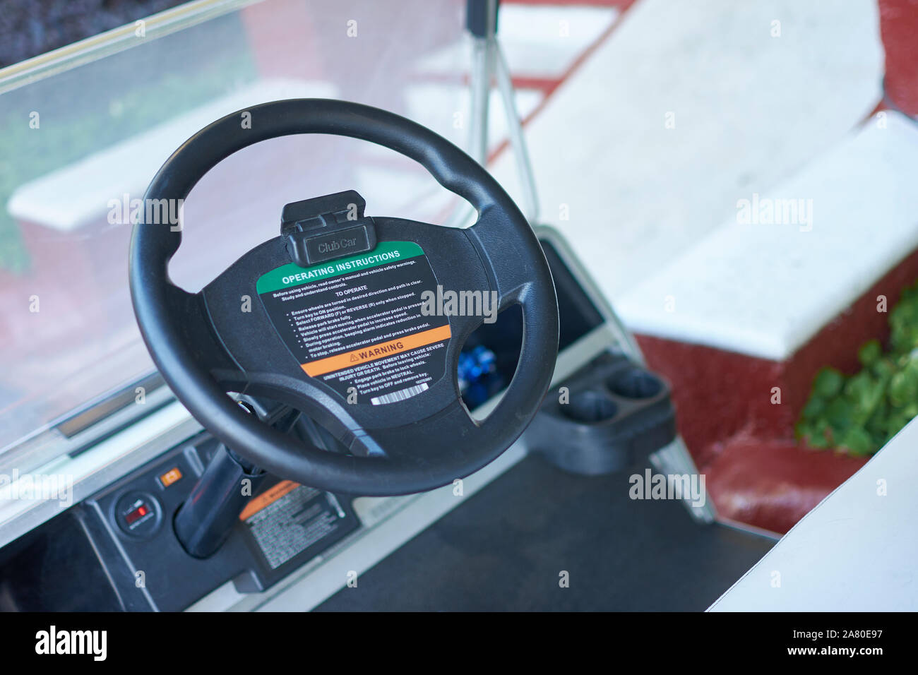 Steering wheel and dashboard of a club car Stock Photo - Alamy