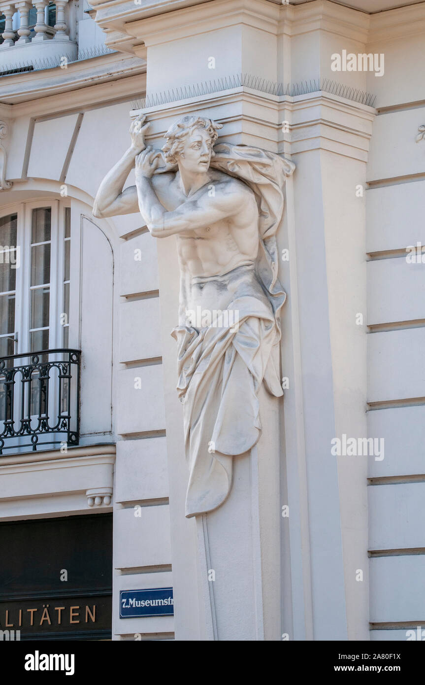 Statue and architectural details on the facade of a building in ...