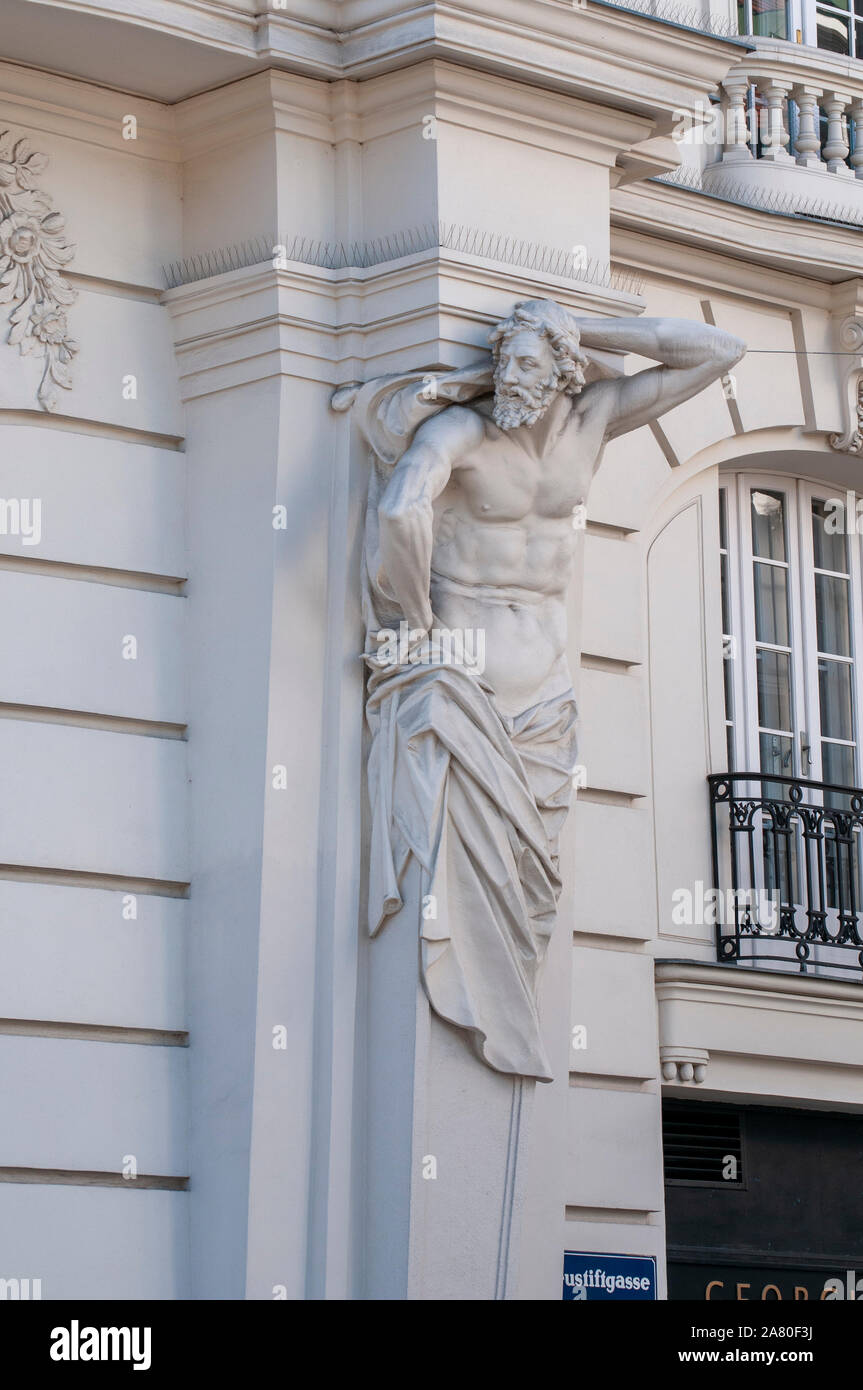Statue and architectural details on the facade of a building in ...