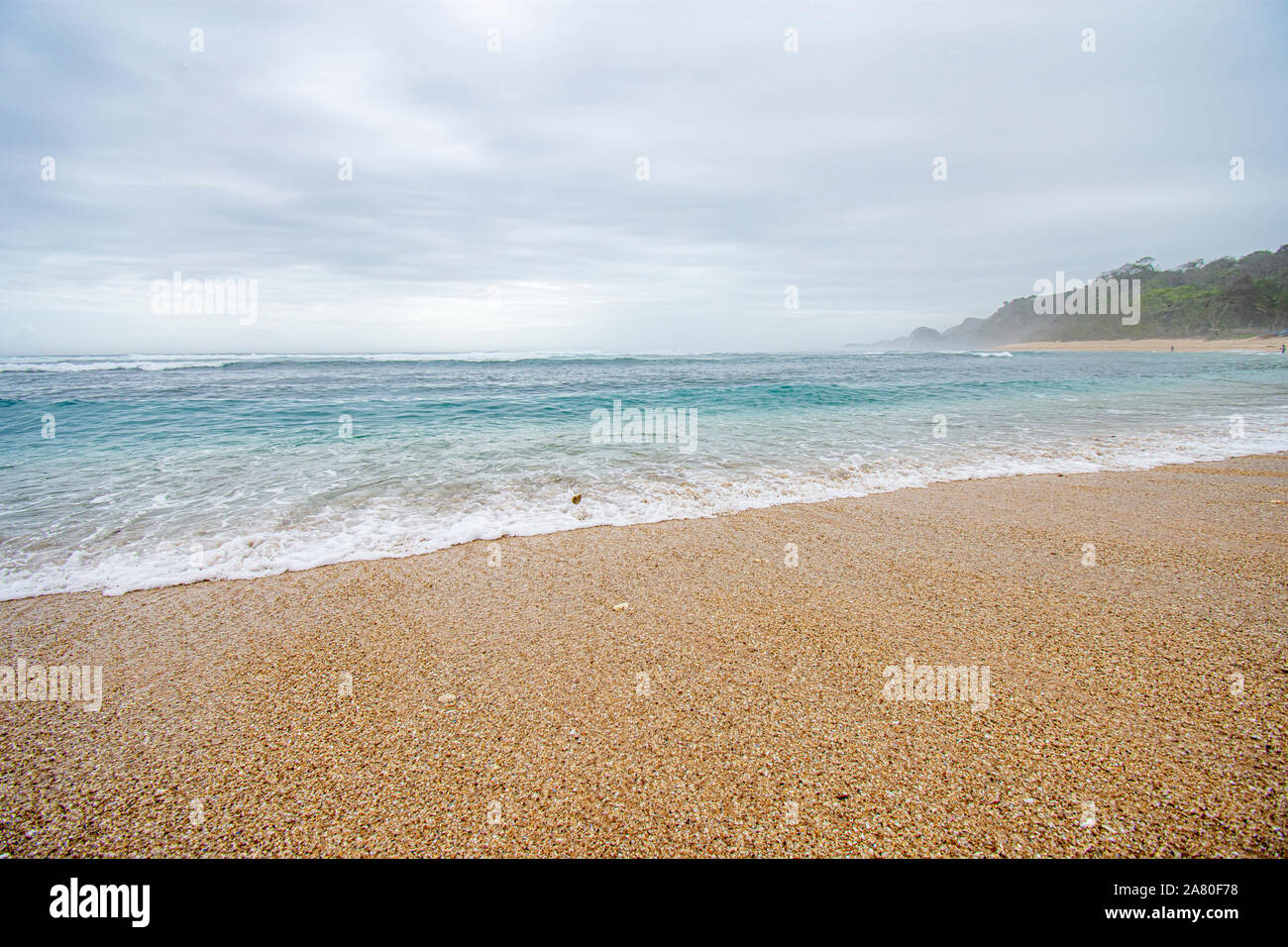 Beautiful beach with brown sand Stock Photo - Alamy
