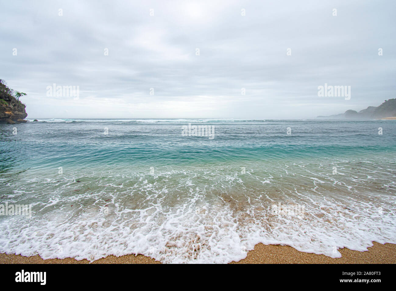 Beautiful beach with brown sand Stock Photo - Alamy