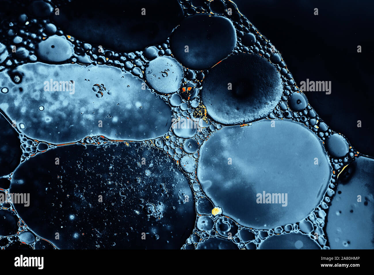 Oil bubbles inside water base form patterns Stock Photo - Alamy