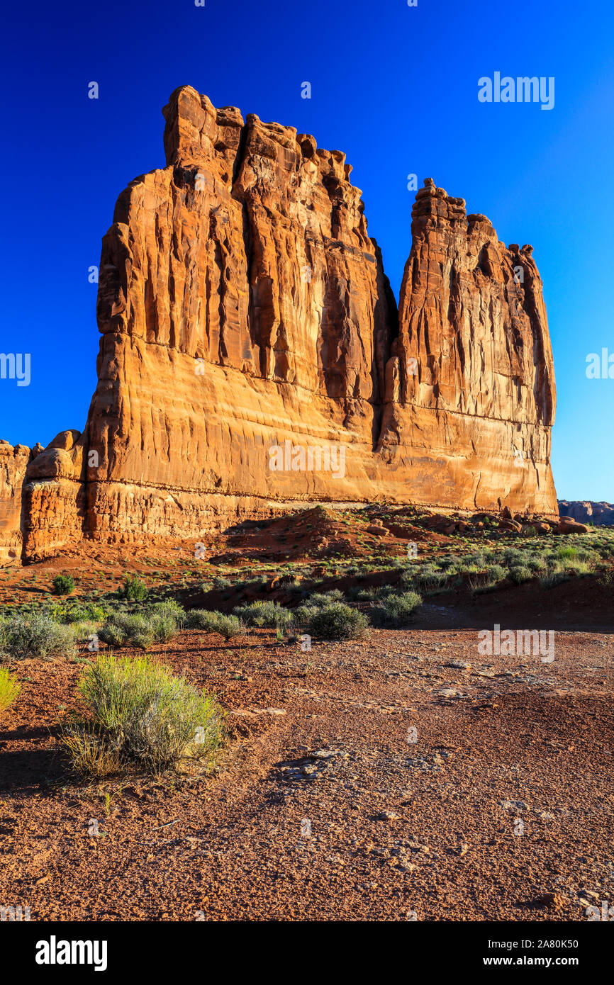 Courthouse Tower Rock formation vertical composition in the desert of ...