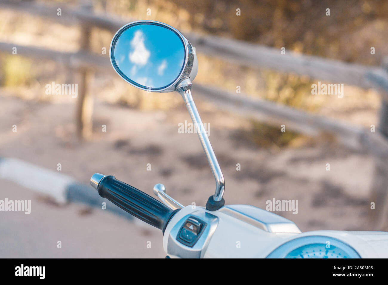 Close-up rear view mirror of a vintage retro scooter Stock Photo - Alamy