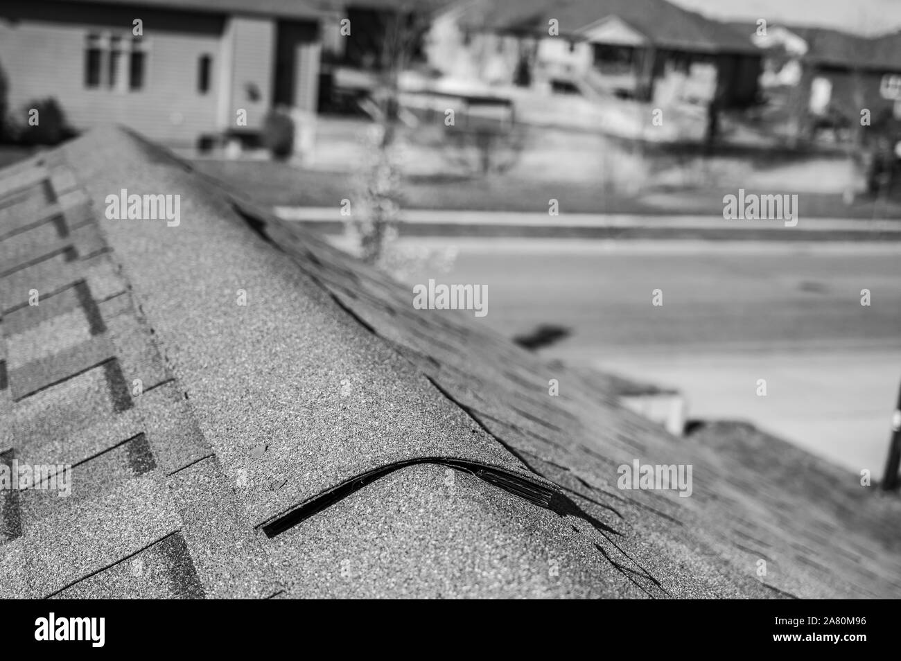 Asphalt shingle room with ridge cap Stock Photo - Alamy