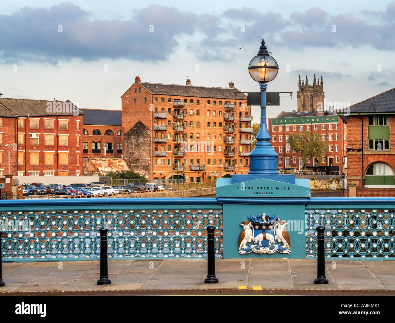 Street lamp lighting up as dusk approaches on Leeds Bridge Leeds West ...