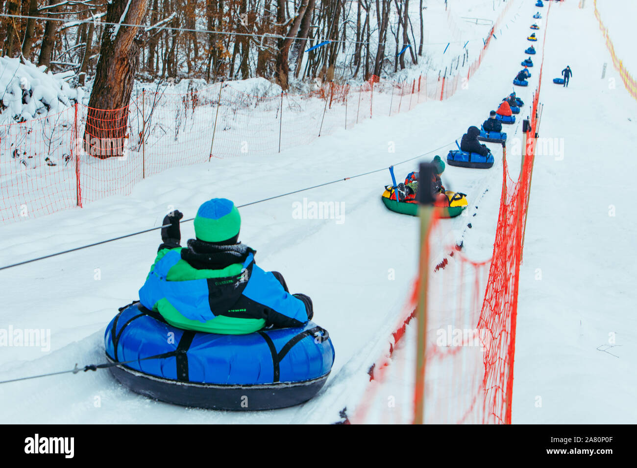 Snow tubing kids hi-res stock photography and images - Alamy