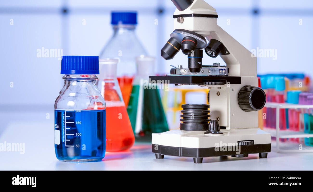 Test tubes and flasks and microscope in a chemical laboratory Stock ...