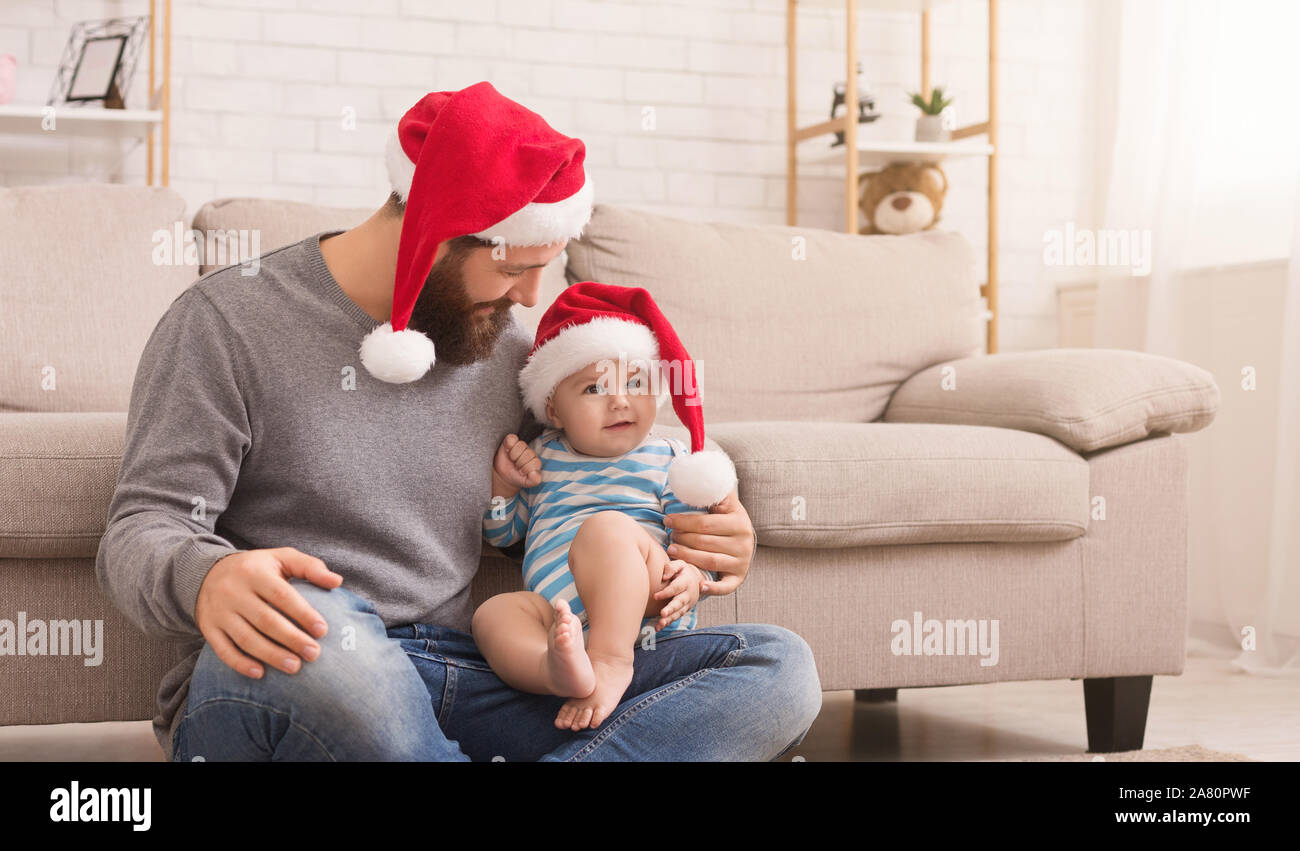 Young dad and his son celebrate christmas together Stock Photo - Alamy