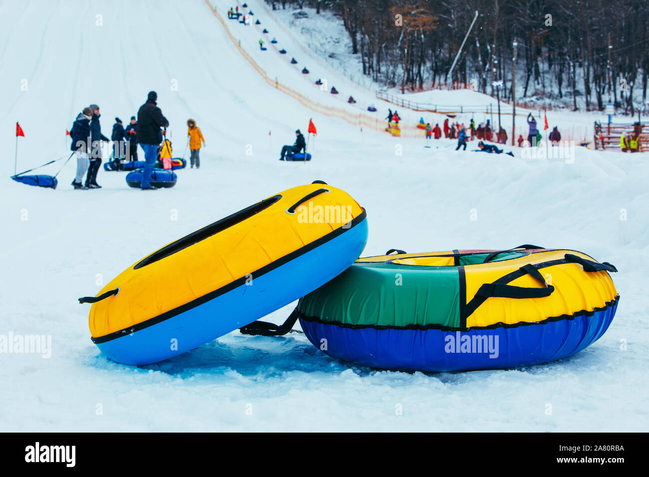 snow tubing rings close up. hill on background Stock Photo - Alamy