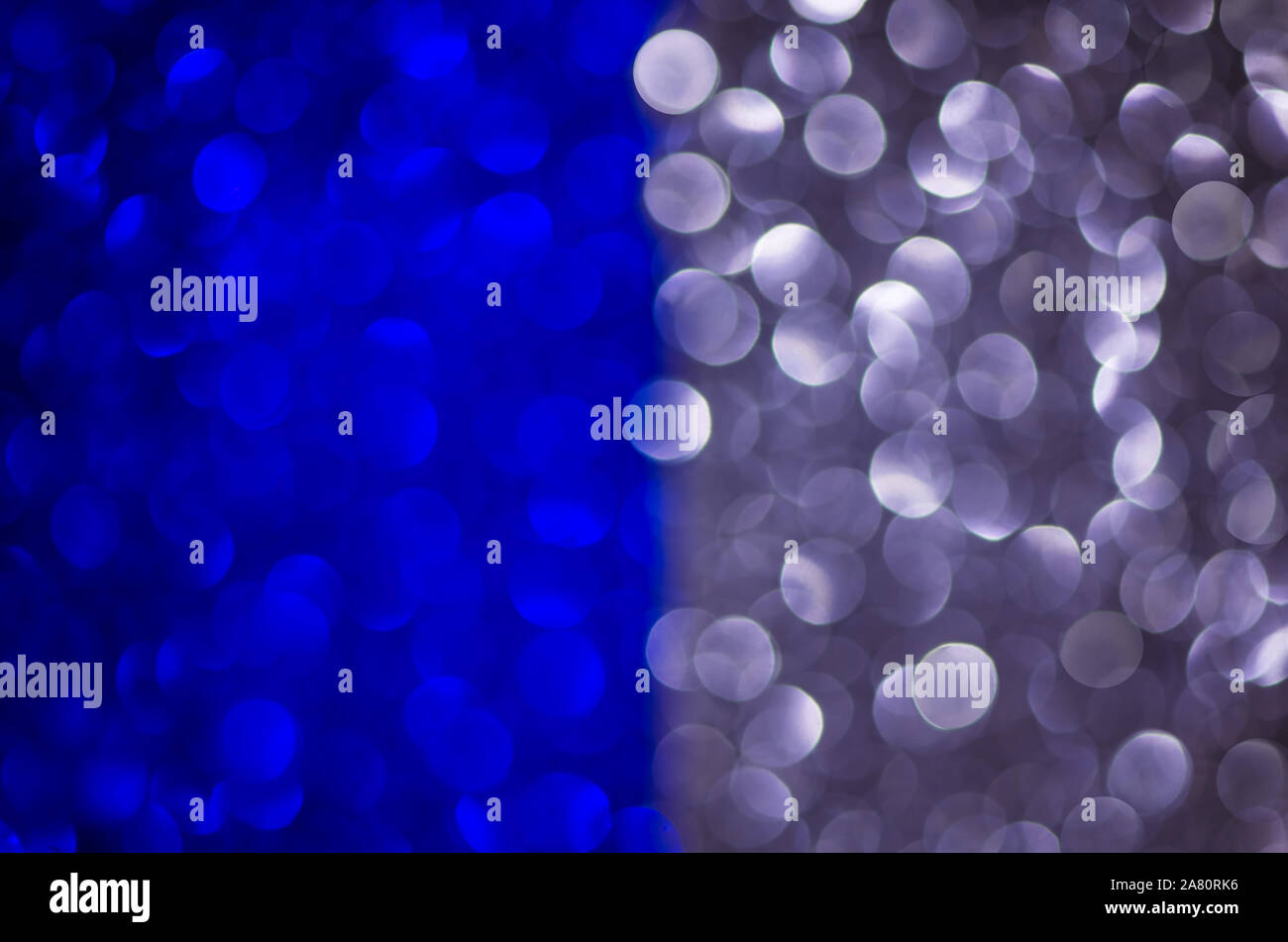 Abstract glitter two color lights background. de-focused. blue, silver ...