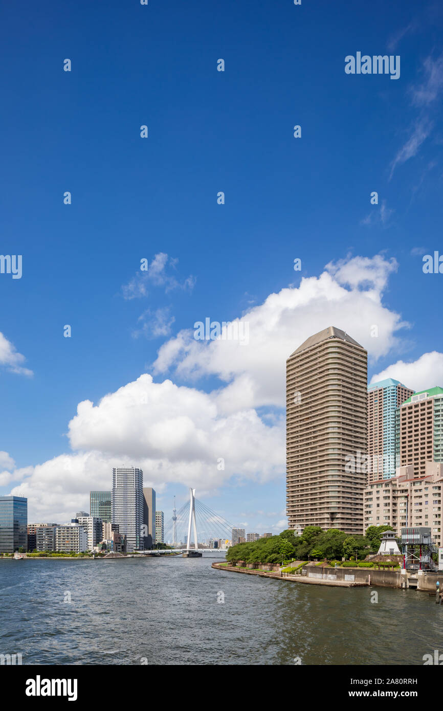 View of Sumida River, Chuo-Ohashi Bridge and tall buildings in Tsukuda ...