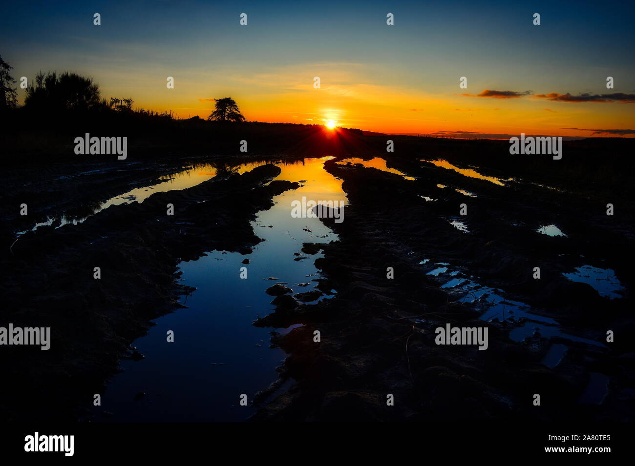 Sunset farm scotland tractor hi-res stock photography and images - Alamy