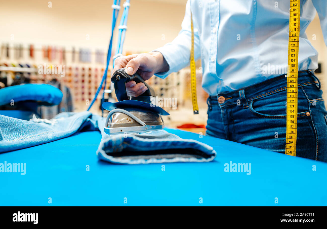 Laundry employee hi-res stock photography and images - Alamy