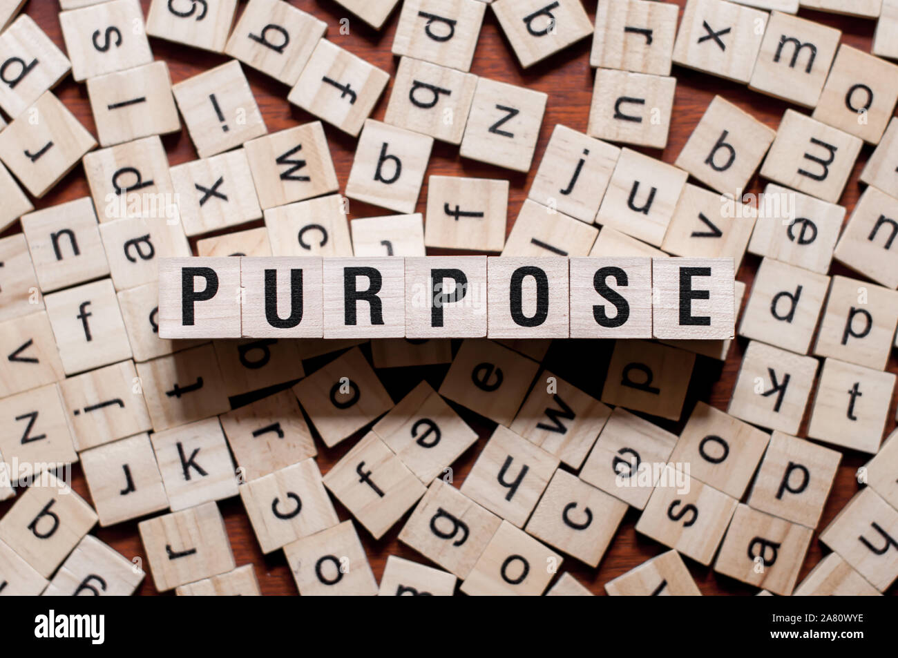 Purpose word concept on cubes for articles Stock Photo - Alamy