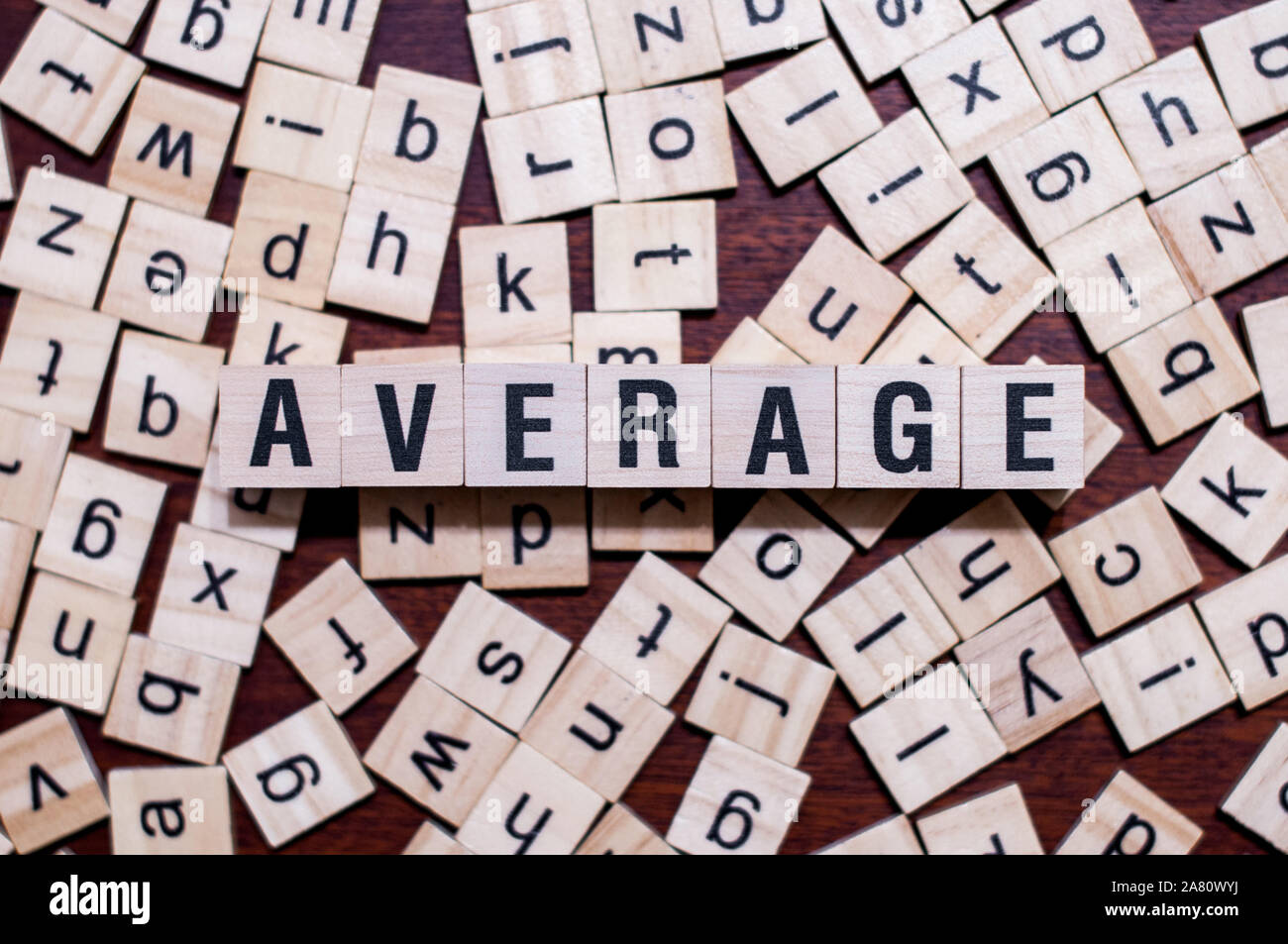 Average word concept on cubes for articles Stock Photo - Alamy
