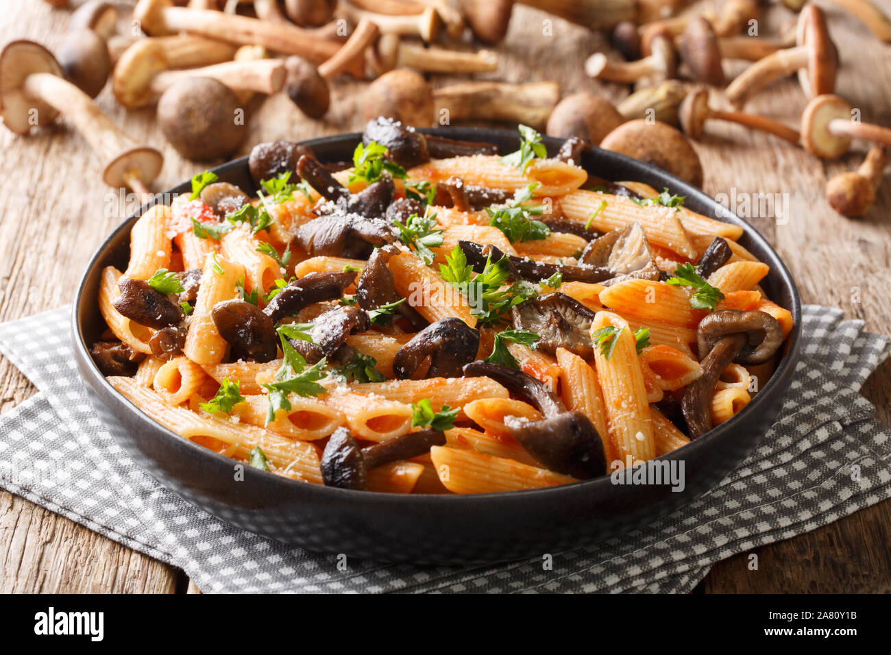 Italian hot pasta with roasted honey mushrooms, parmesan and tomato ...