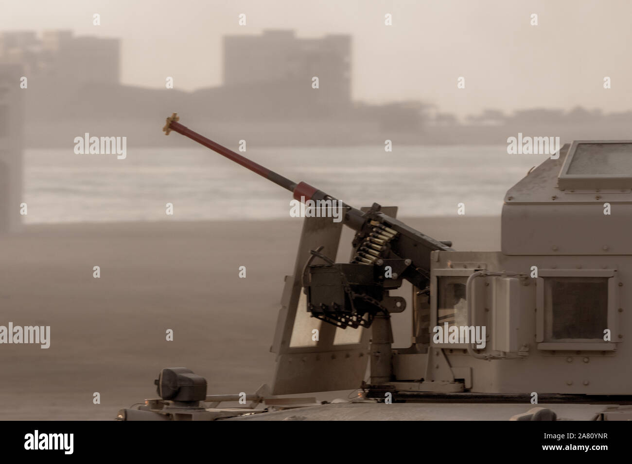 Military tank army vehicle close up of guns and military personel ...
