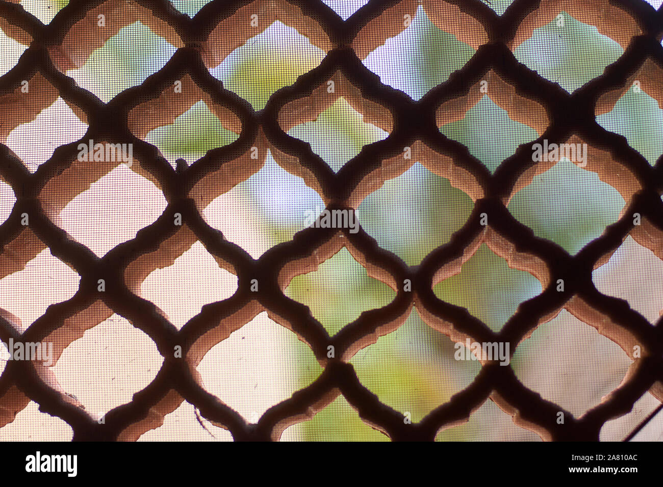 Detail of a lattice from holes Stock Photo - Alamy