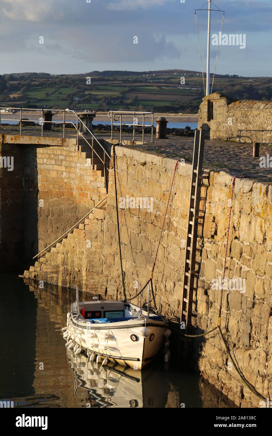 Small boat in harbour Stock Photo - Alamy