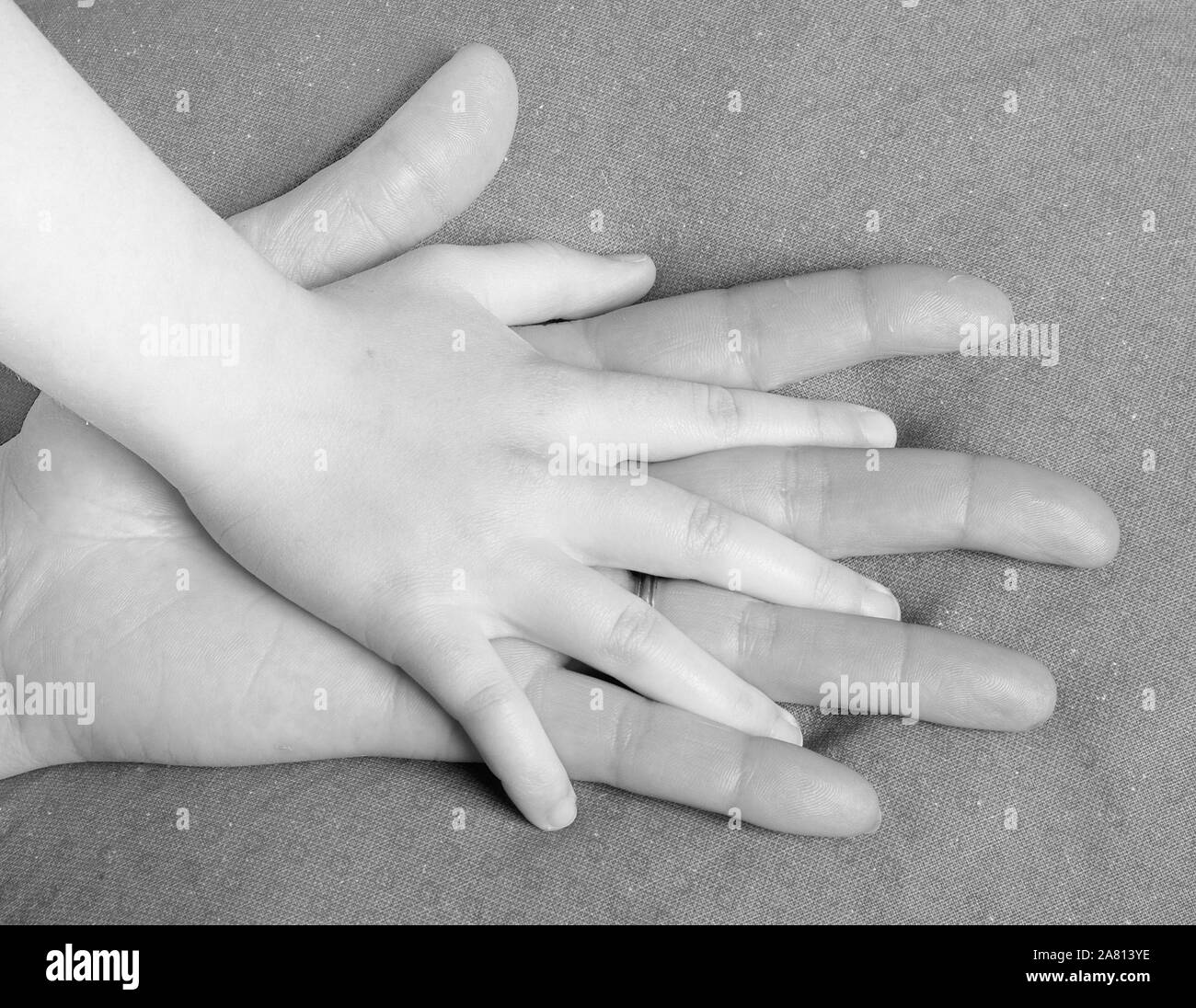 Hand together love family sign Stock Photo - Alamy