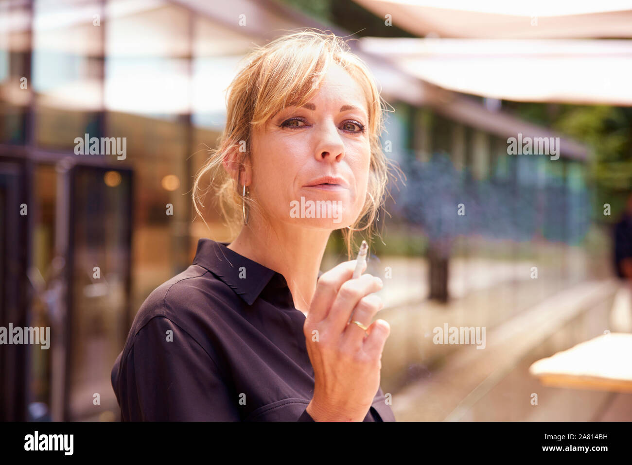 Female smoking mature woman hi-res stock photography and images - Alamy