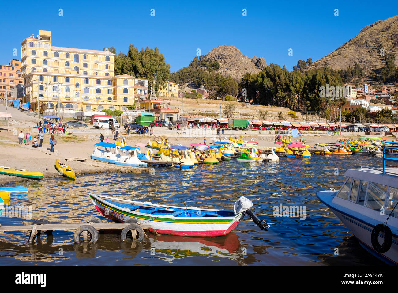 Colorful small boats on the beach shore in Copacabana, Bolivia Stock ...