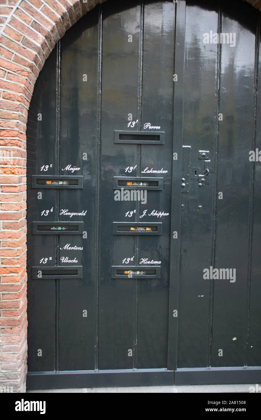MAIL BOXES in front door in Amsterdam Stock Photo - Alamy