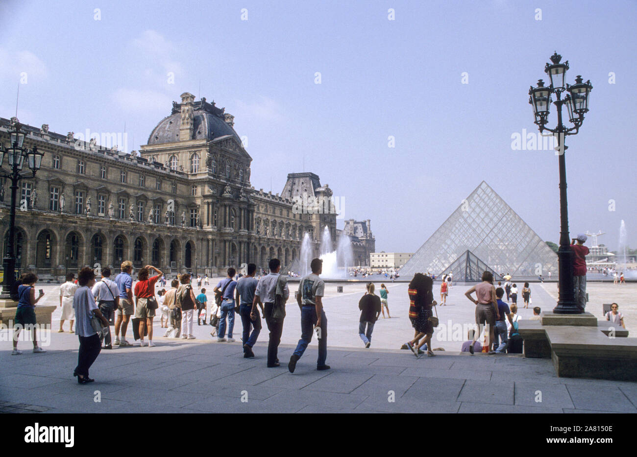LOUVREN Museum Paris France with tourists outside Stock Photo - Alamy