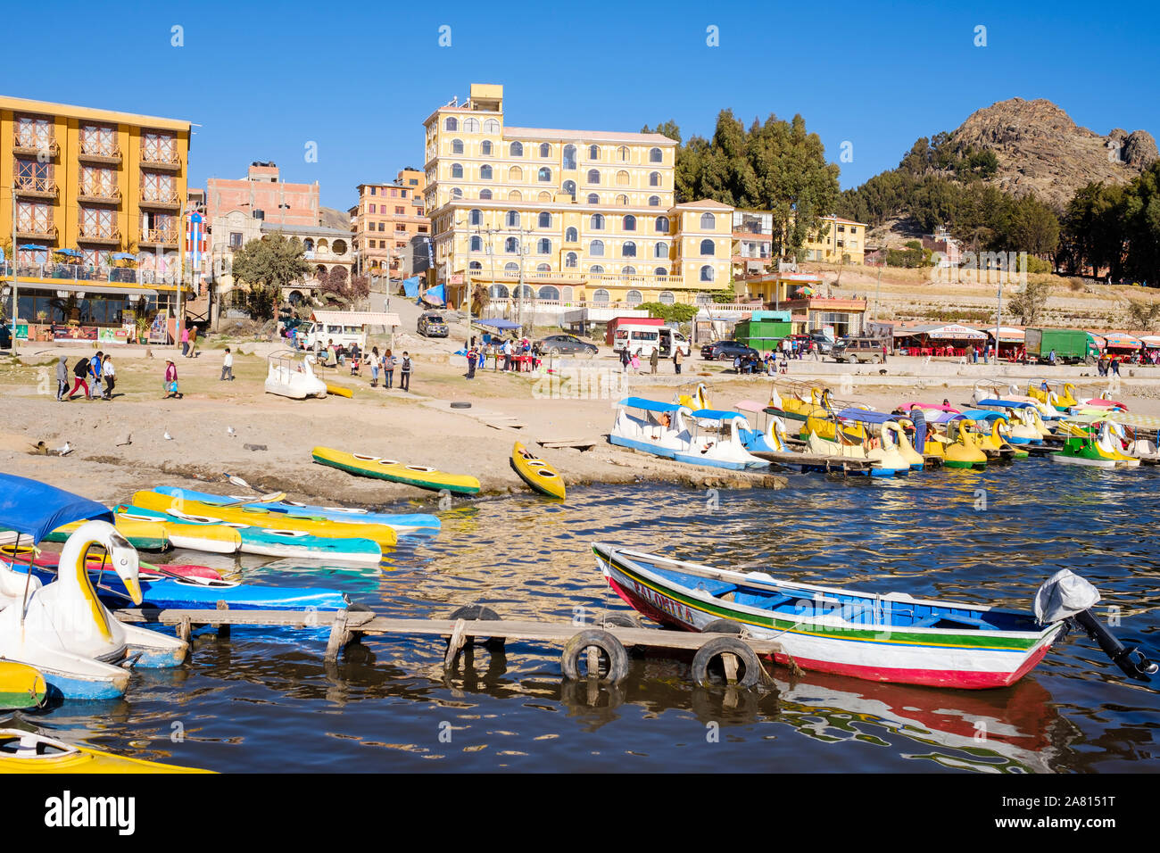 Colorful small boats on the beach shore in Copacabana, Bolivia Stock ...