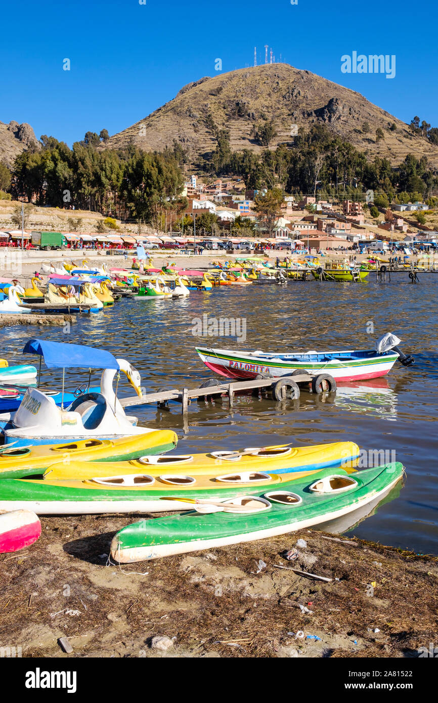 Colorful small boats on the beach shore in Copacabana, Bolivia Stock ...