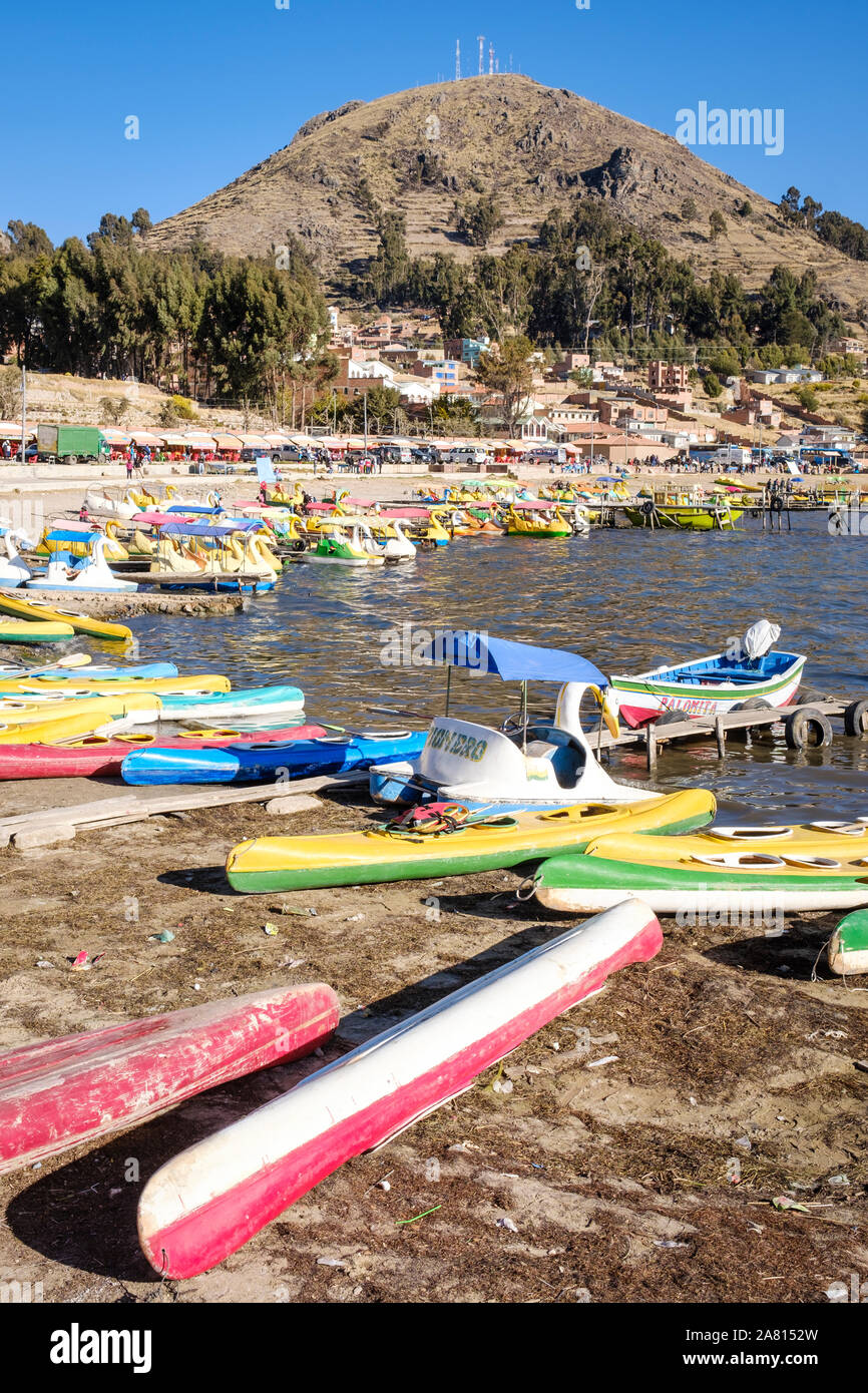 Colorful small boats on the beach shore in Copacabana, Bolivia Stock ...