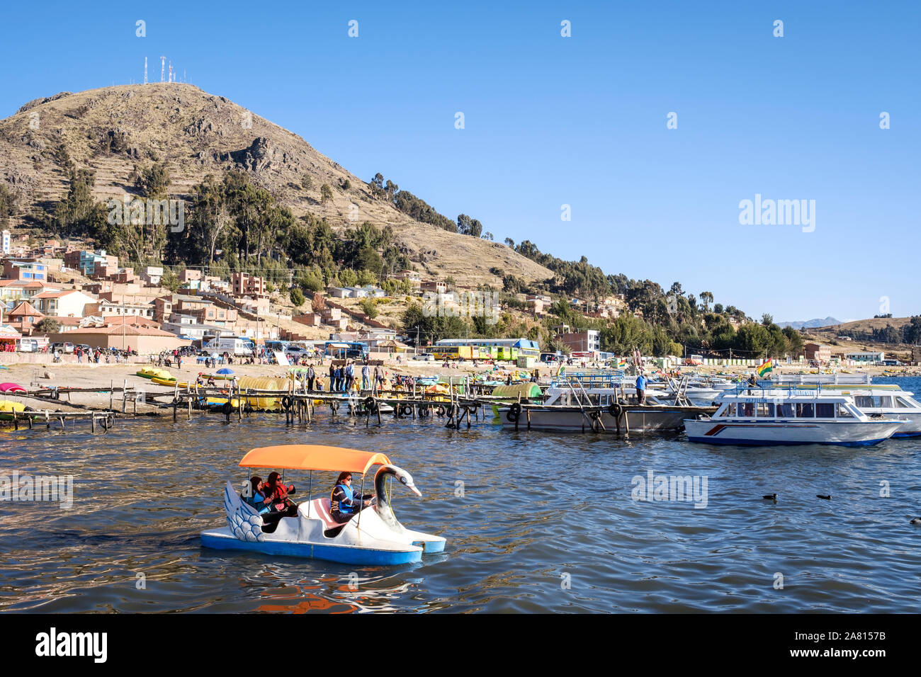 Local people riding on a duck shaped boat in Copacabana beach, Bolivia ...