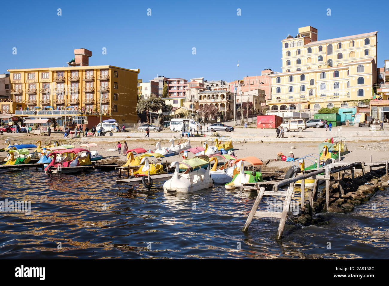 Colorful small boats on the beach shore in Copacabana, Bolivia Stock ...