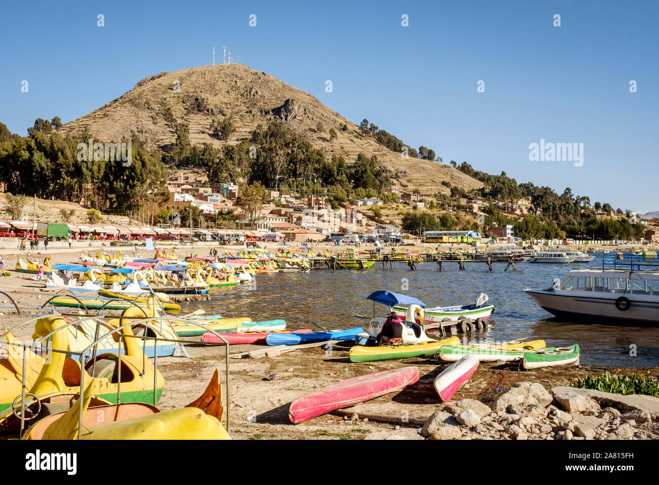 Colorful small boats on the beach shore in Copacabana, Bolivia Stock ...