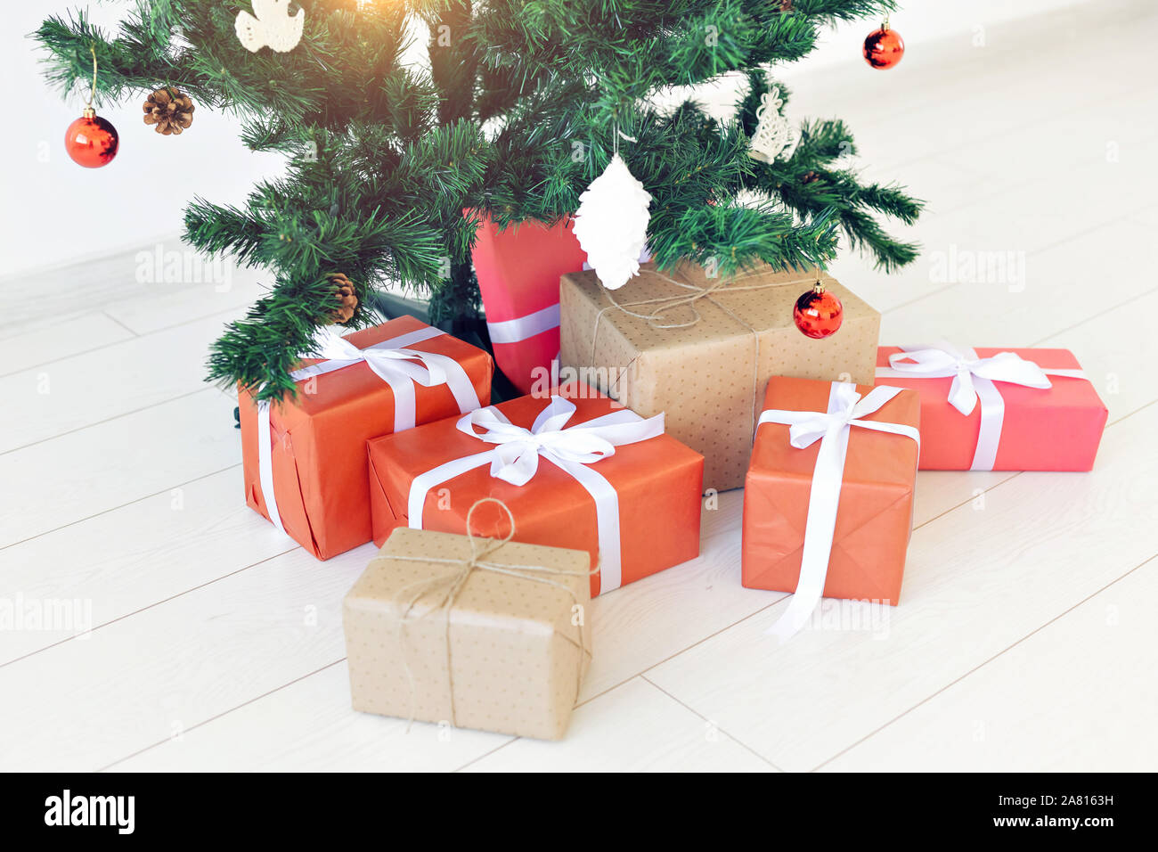 Christmas gift boxes and fir tree, top view Stock Photo - Alamy