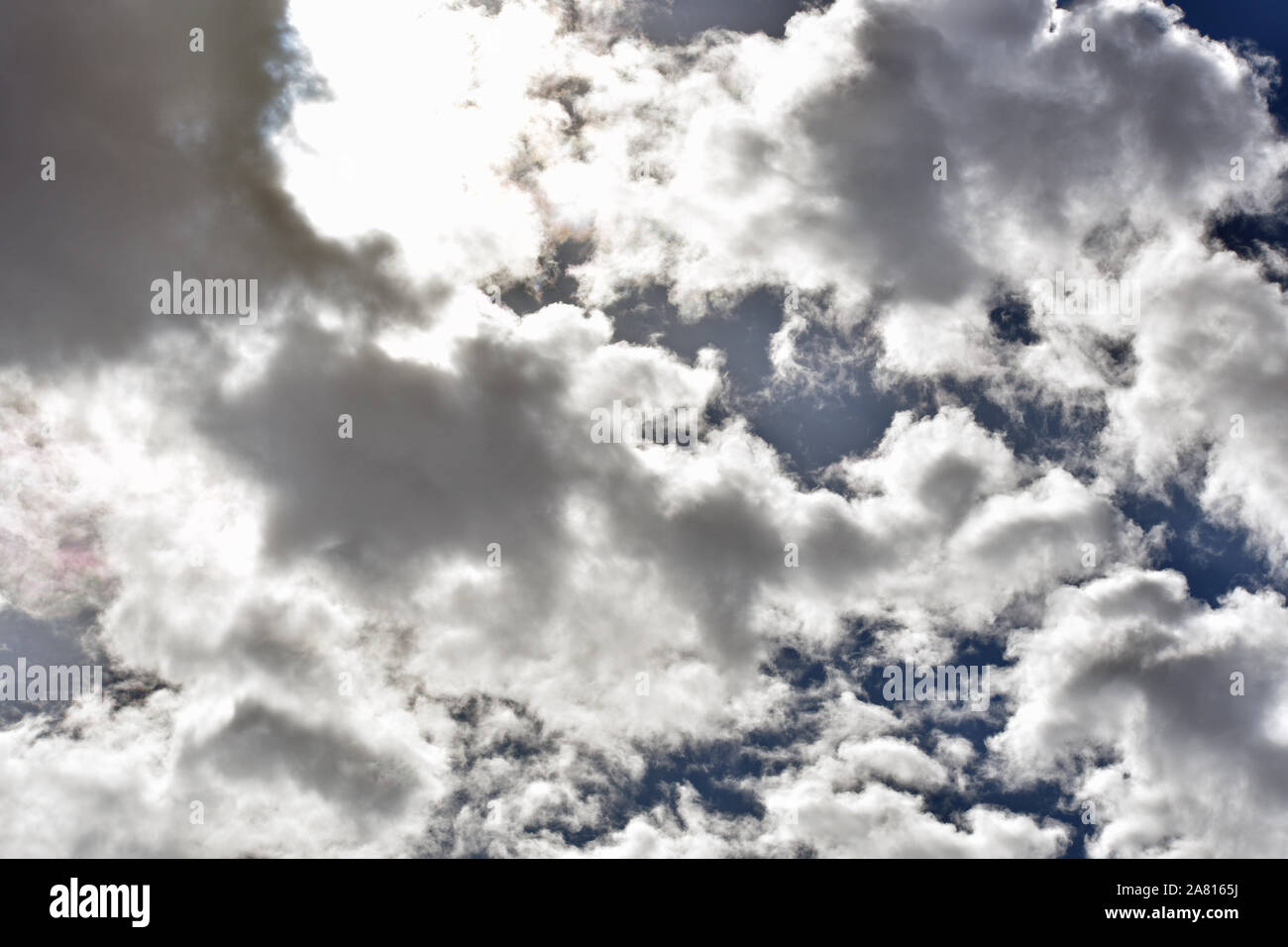 Clouds floating in a Blue Sky Stock Photo - Alamy