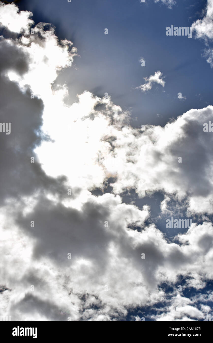 Clouds floating in a Blue Sky Stock Photo - Alamy