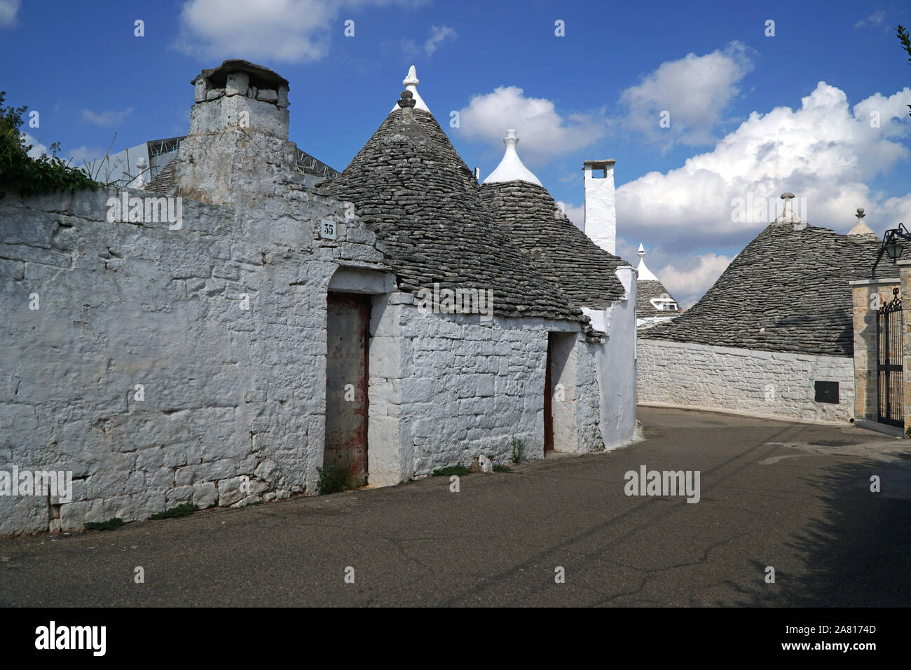 Traditional trulli houses in Alberobello, Puglia, Italy Stock Photo - Alamy
