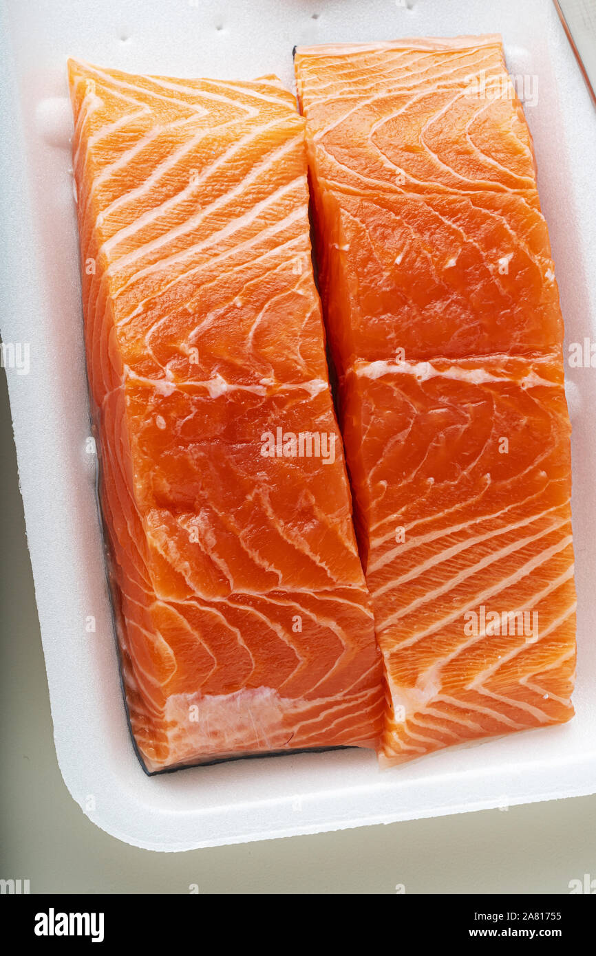 fresh salmon, cut into pieces and ready for cooking. fish cutting Stock ...