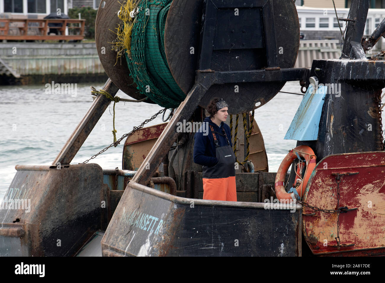 Fishing boat coming into port in Galilee Rhode Island Stock Photo - Alamy