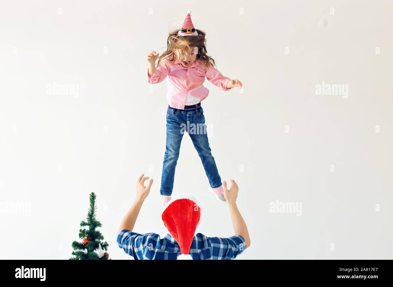 Christmas, holidays and fatherhood concept - Funny dad wearing santa ...