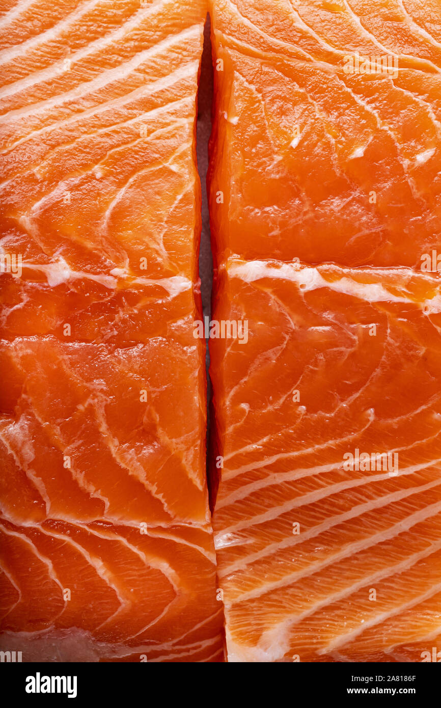 fresh salmon, cut into pieces and ready for cooking. fish cutting Stock ...