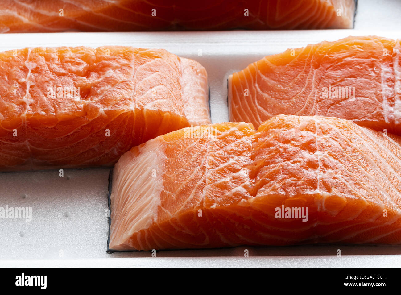 fresh salmon, cut into pieces and ready for cooking. fish cutting Stock ...