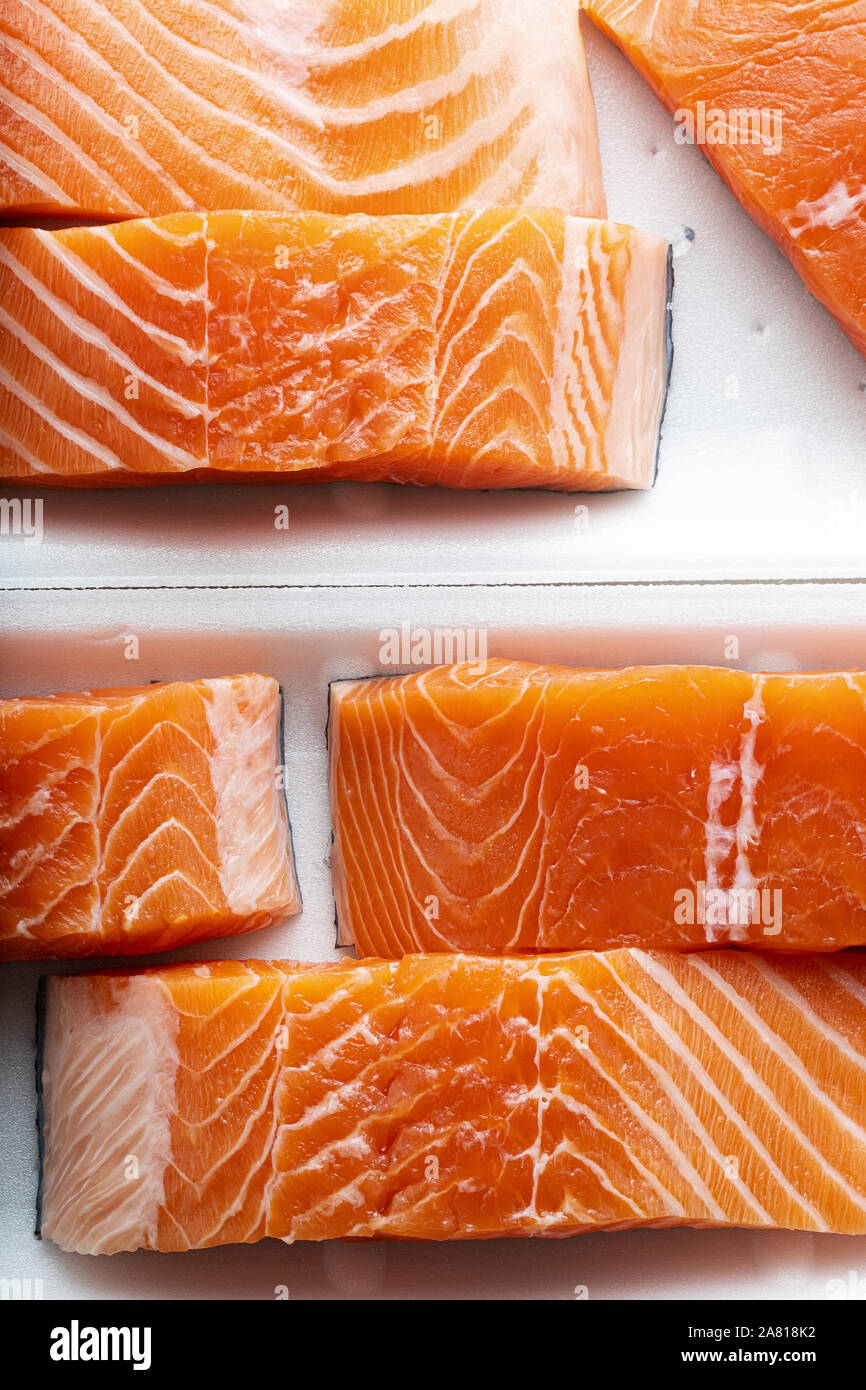 fresh salmon, cut into pieces and ready for cooking. fish cutting Stock ...