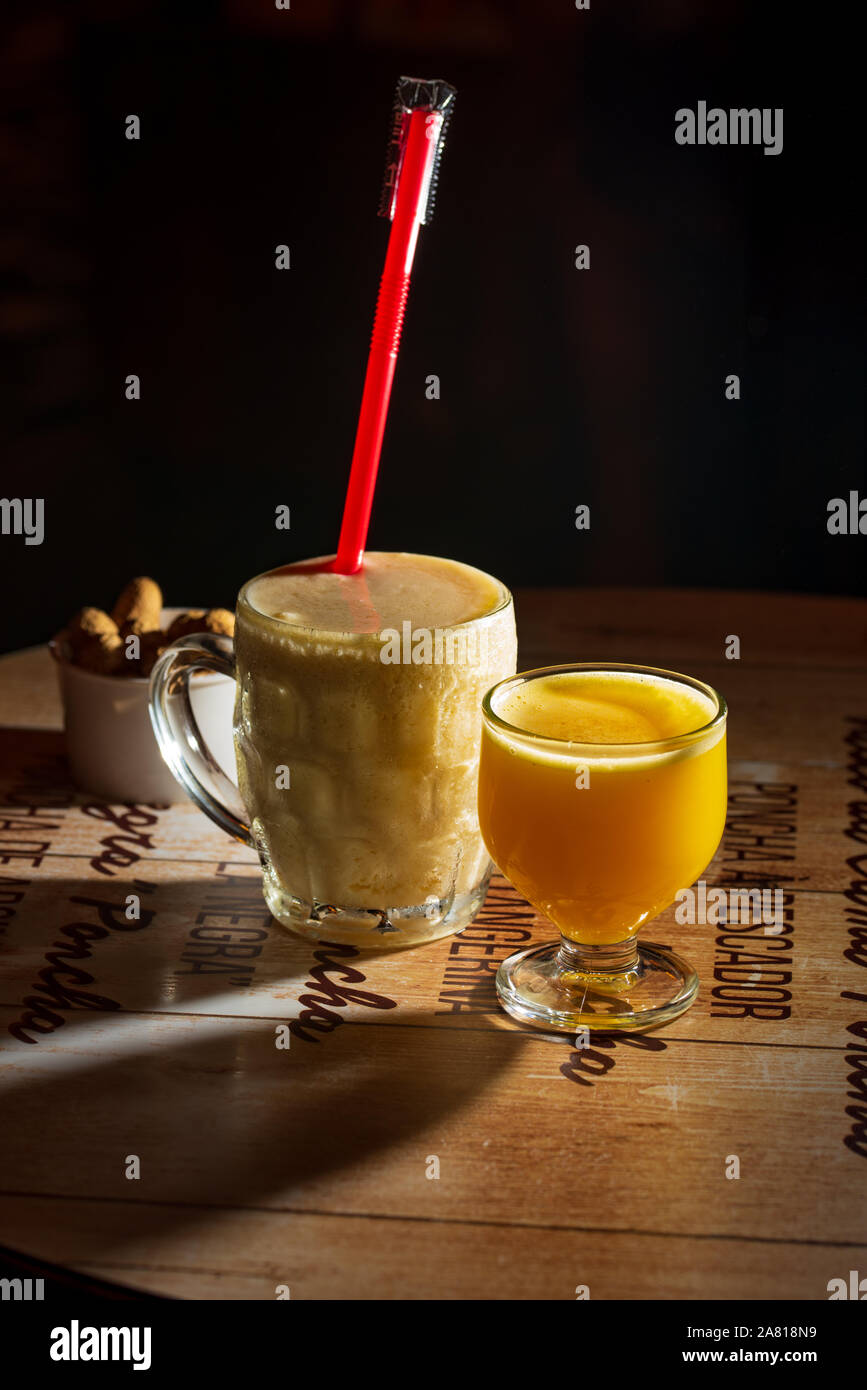 Two glasses of Poncha, the traditional Madeira cocktail, served with a ...